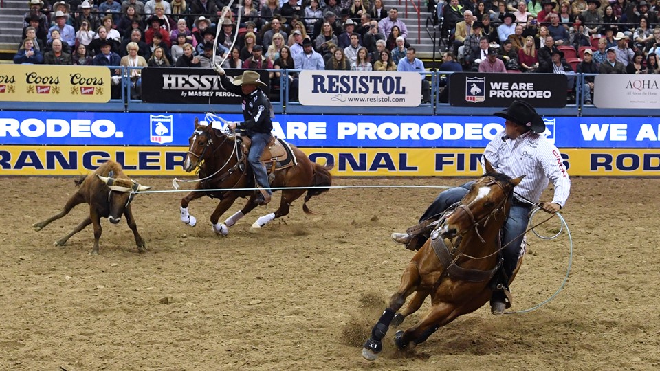 Erich Rogers and Clint Summers compete in team roping
