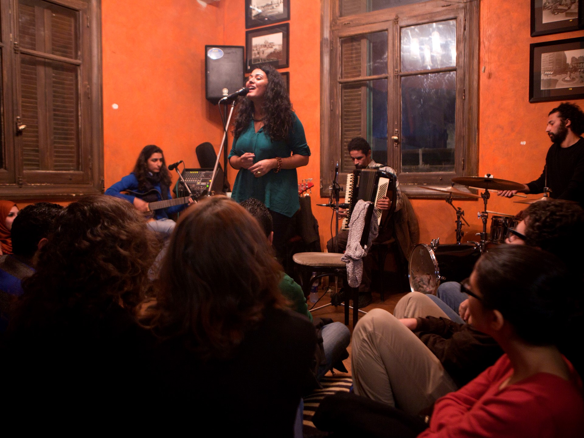 Dina El Wedidi and her band play at the Sufi Bookstore in Zamalek, Cairo.